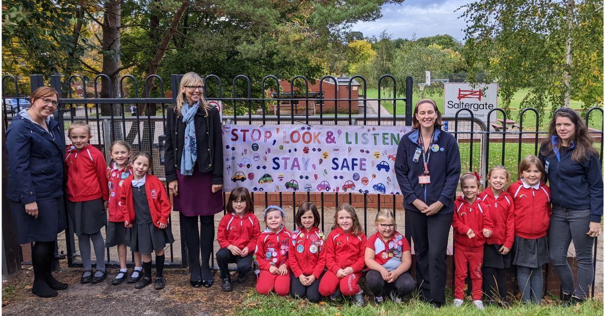 Rainbows design road safety banner for Saltergate School