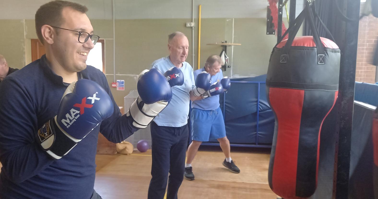 MP learns fancy footwork at charity boxing class